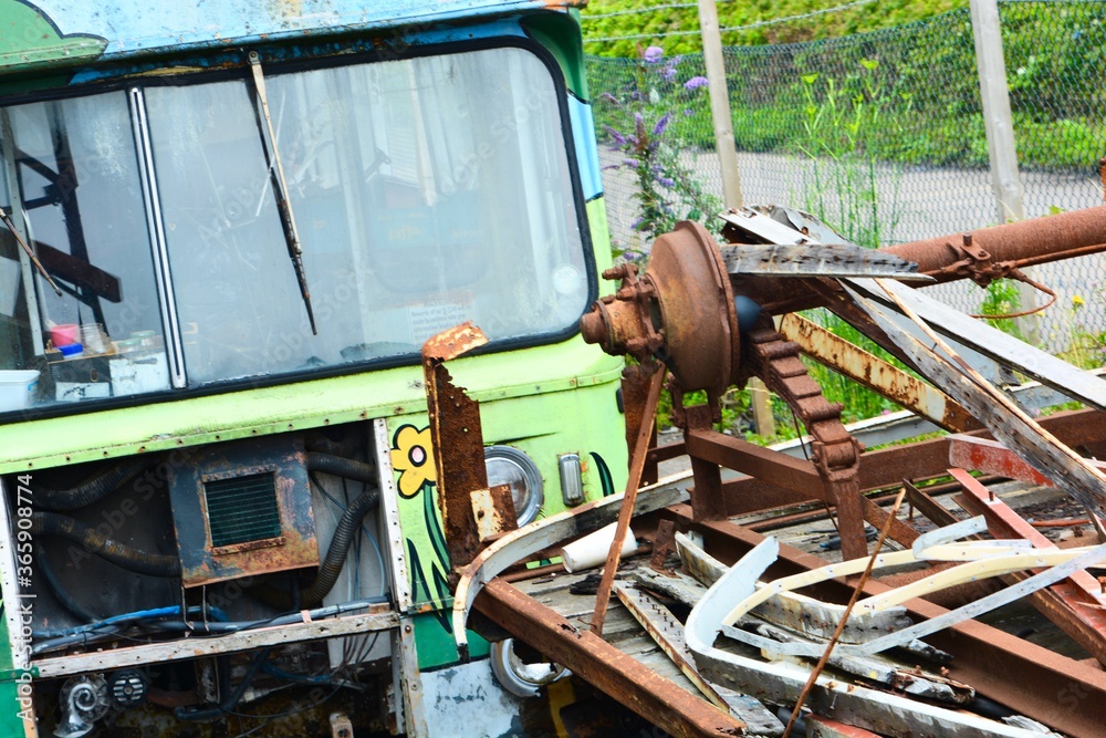 Foto de Bus graveyard, rusty and broken buses used for scrap over the ...