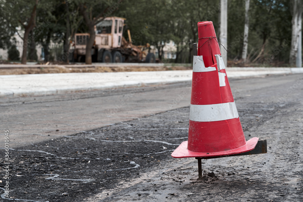 road construction or repair - laying a new layer of asphalt, marking ...