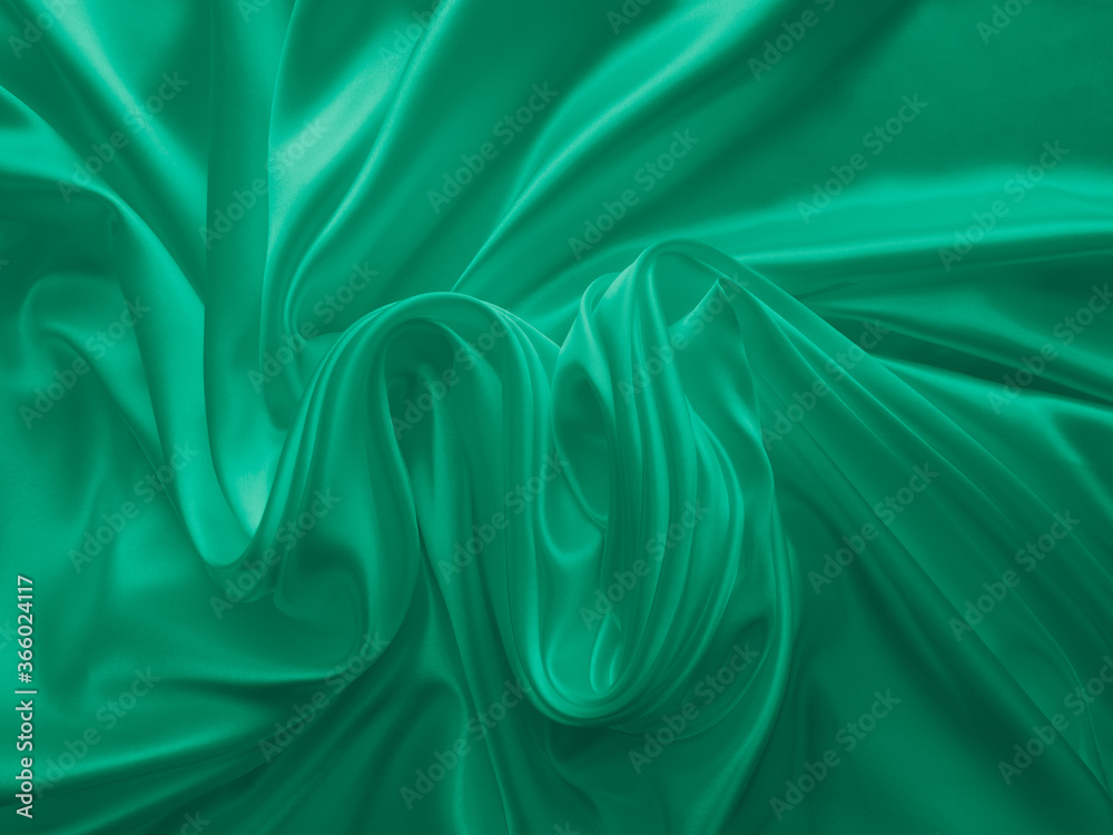 Beautiful elegant wavy emerald green satin silk luxury cloth fabric ...