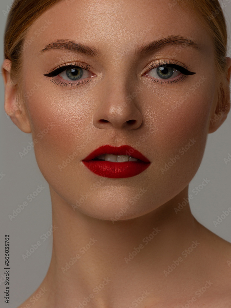 Beautiful red-hair model woman face with green eyes and perfect make-up ...