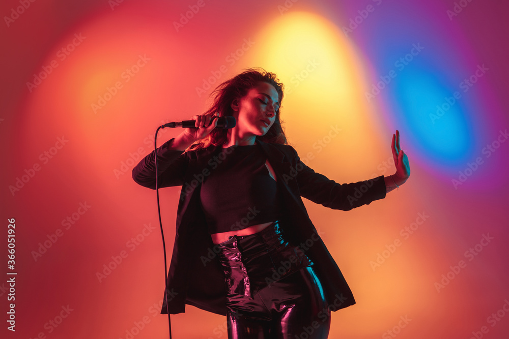 Dancing. Young caucasian inspired and expressive musician, female ...