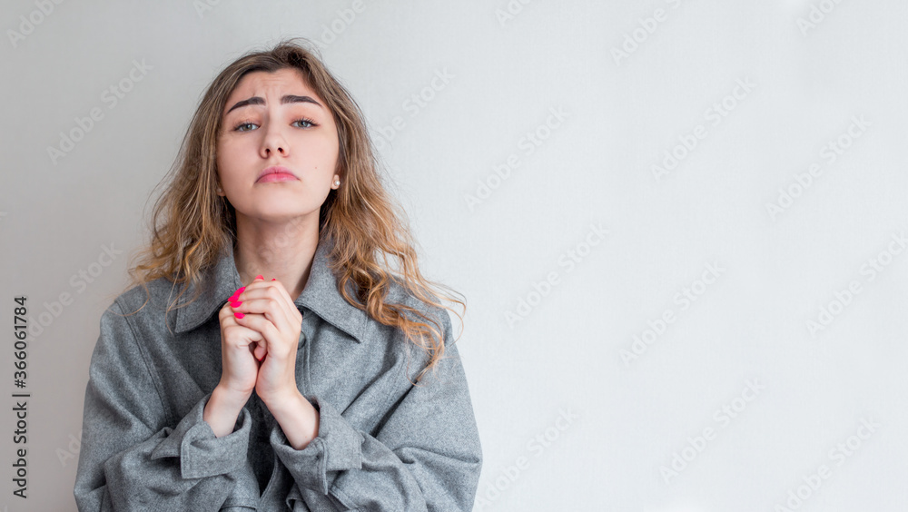 Closeup portrait of sad, hopeful young woman, mother praying, hoping ...