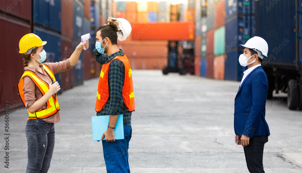 Temperature measurement with employee temperature meter before entering ...