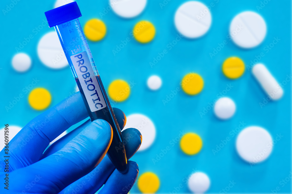Probiotics. Test tube with probiotics in hands of doctor. Microbiology ...