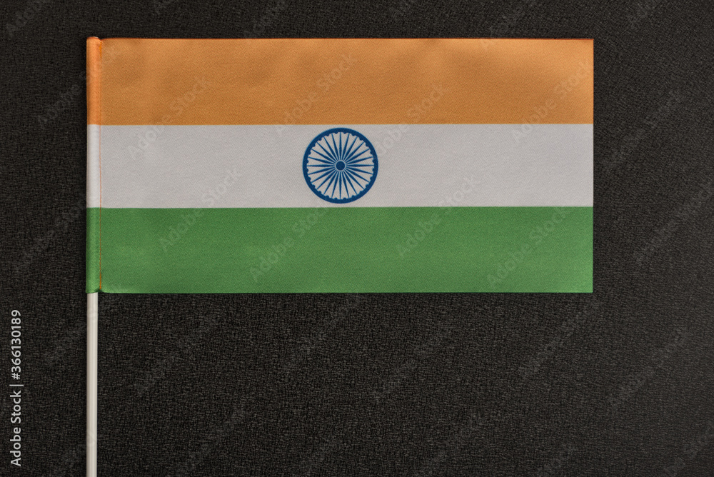 Table flag of India on black background. National symbols of India ...