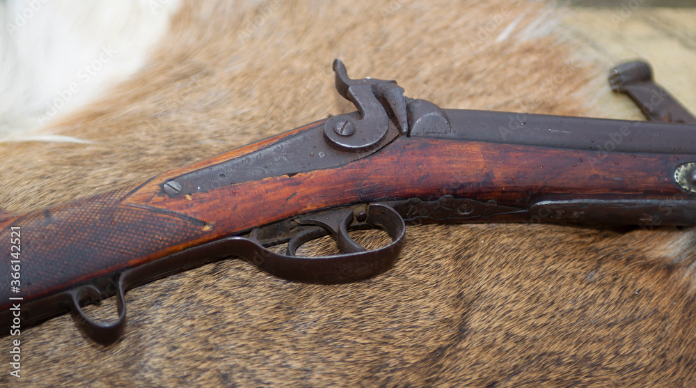 Early flintlock and percussion firearms Stock Photo | Adobe Stock