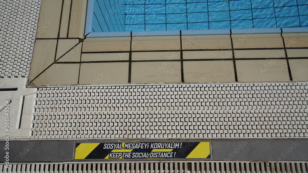 Pool markings on the floor, keep a social distance. a marking on the ...