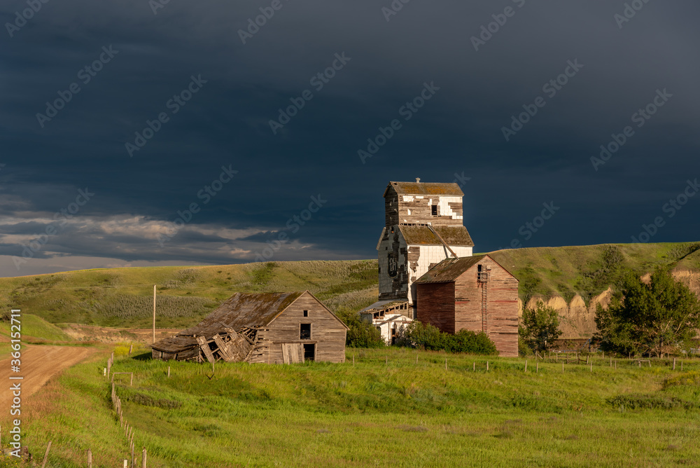 Old abandoned grain elevator in the badlands ghost town of Sharples ...