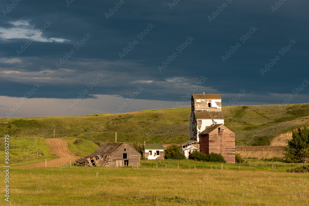Old abandoned grain elevator in the badlands ghost town of Sharples ...