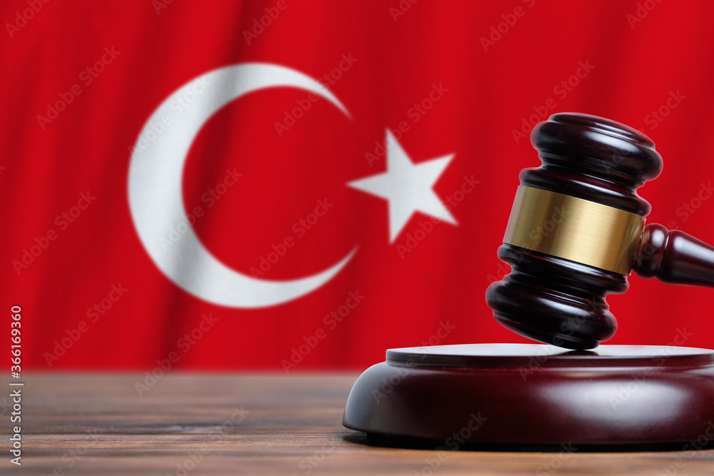 Justice and court concept in Republic of Turkey. Judge hammer on a flag ...