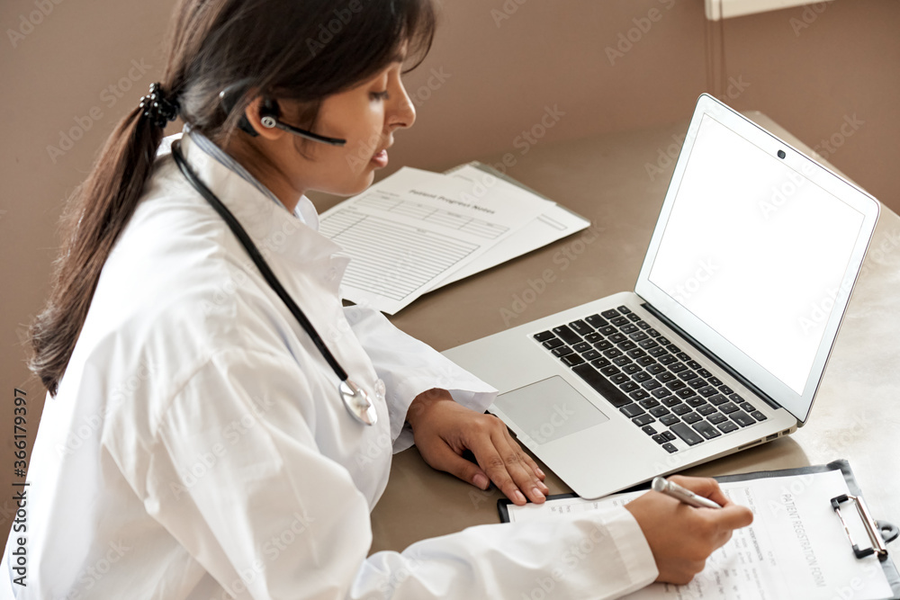 Indian telemedicine doctor wear headset consulting patient by online ...