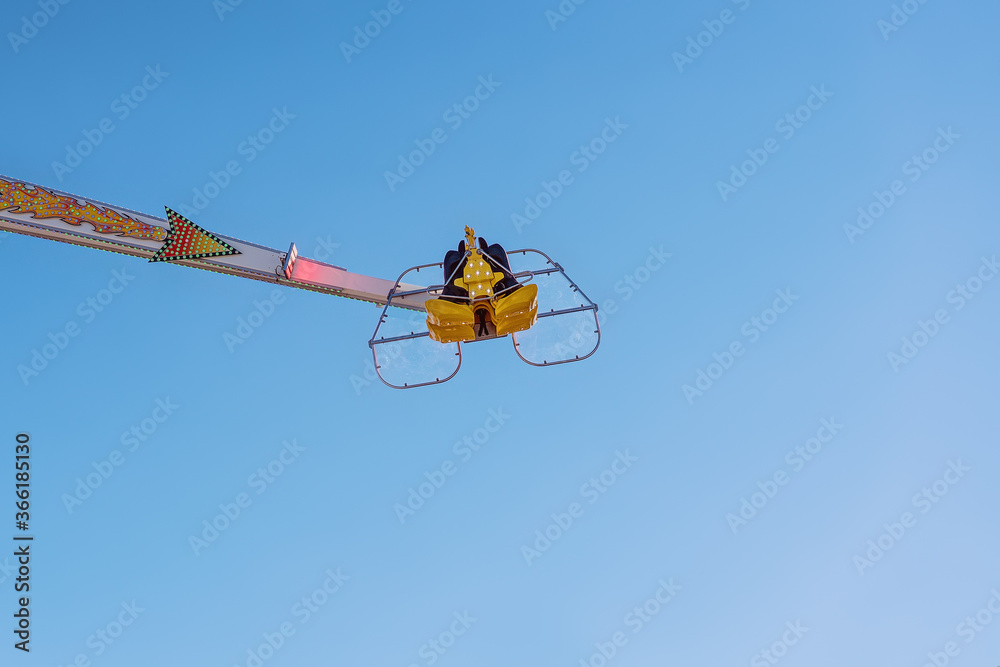 MACKAY, QUEENSLAND, AUSTRALIA - JUNE 2019: A fast thrill ride for older ...