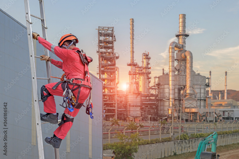 Construction worker wearing safety harness belt during working at high ...