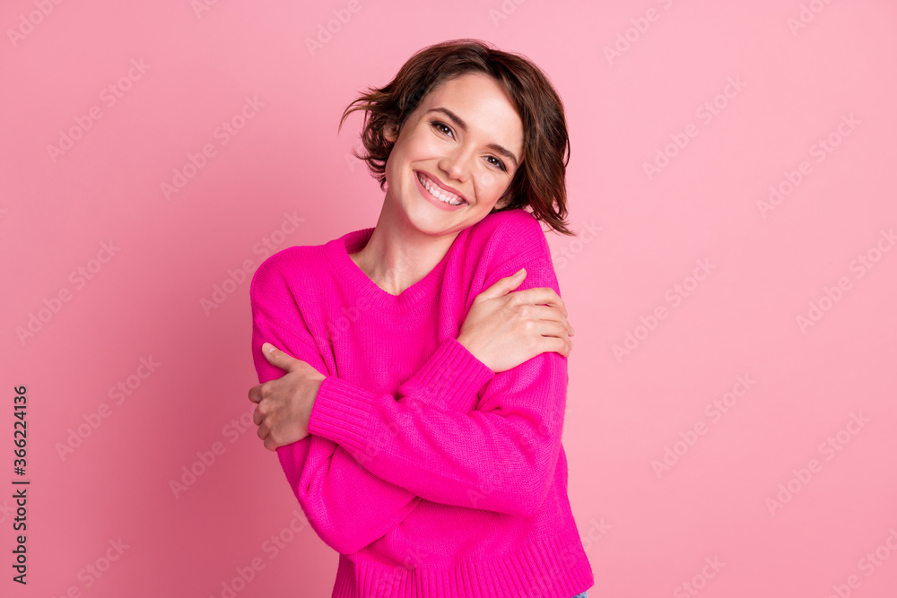 Photo of overjoyed lady good mood hands hug herself shoulders enjoy ...
