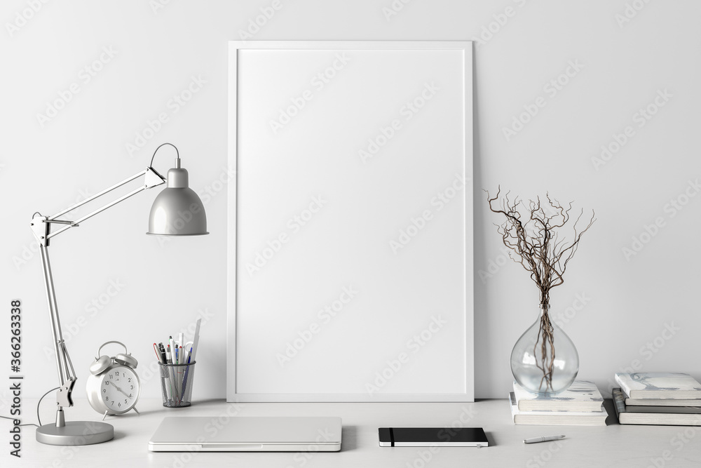 Vertical poster frame mockup on the white table of home studio ...