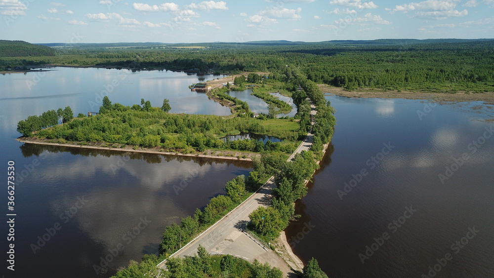 Aerial view of river Kama, Perm krai, Russia. Highway in the middle of ...