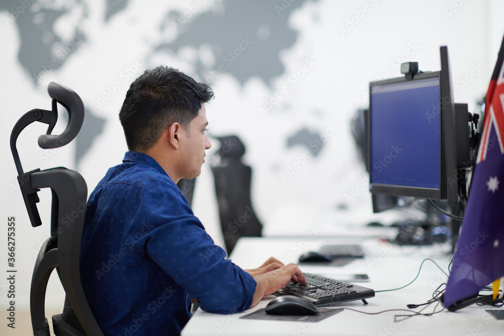 casual indian business man working on desktop computer Stock Photo ...