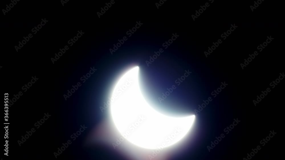 solar eclipse in the Dubai desert. middle phase of the eclipse. camera ...