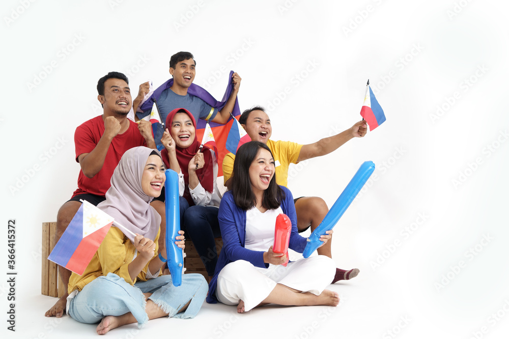filipino group of people holding philippines flag celebrating ...