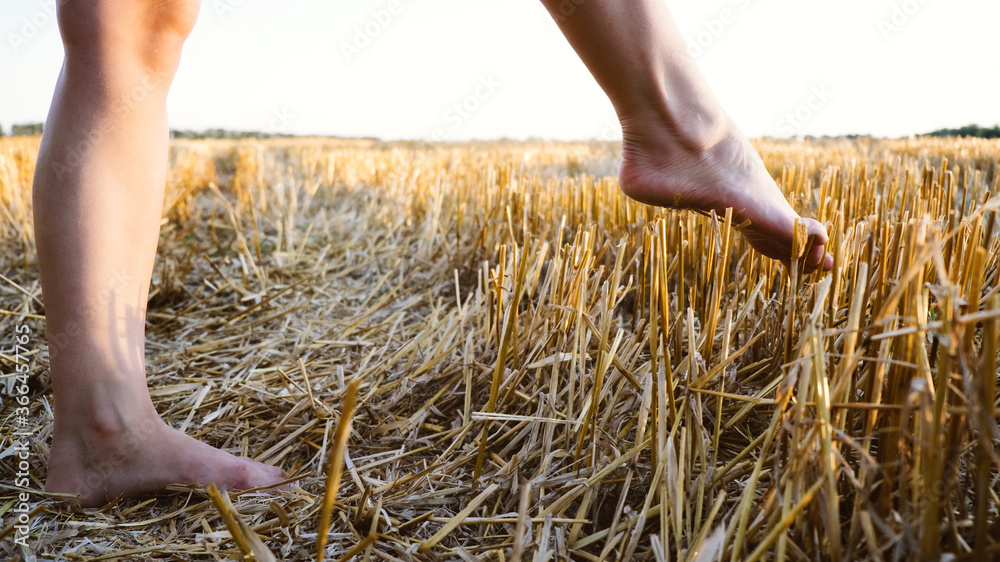 Overcome obstacles depression concept. A woman's bare foot makes a step ...