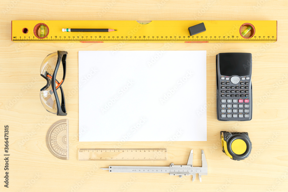 Top view engineer desk light brown wood texture have roll home plan and ...