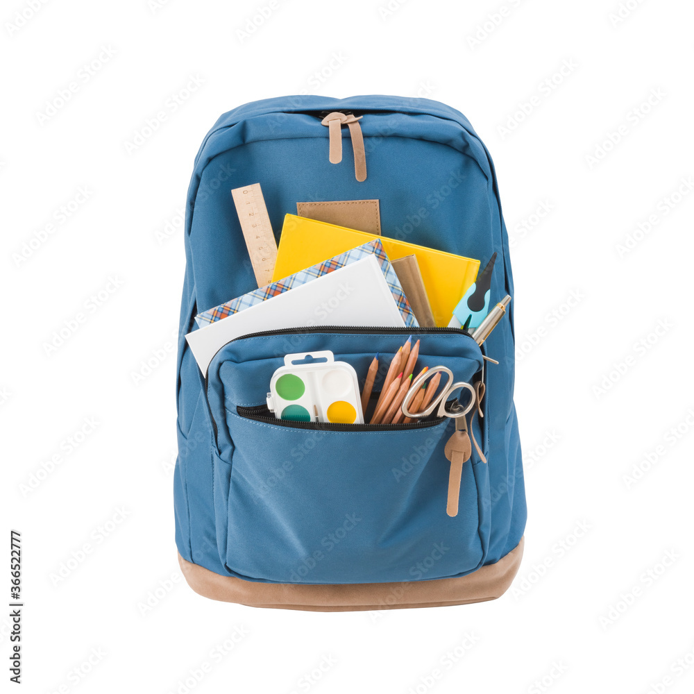 Blue school backpack with various supplies isolated on white background ...