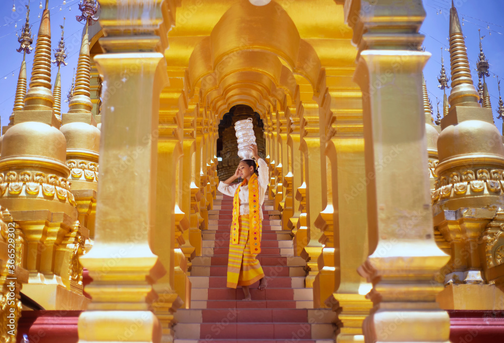 Women Burmese Buddhist faithful are walking barefoot around the ...
