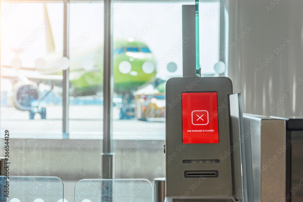 Red Cross the passage is closed sign empty gateway terminal area in ...