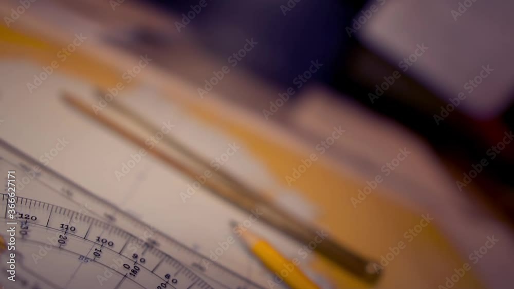 Plotting position on navigational chart at sea. Marine Map and ruler ...