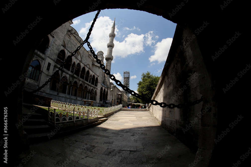 View through the Sultan Gate to the side entrance of the Blue Mosque in ...