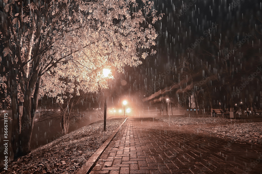 abstract autumn rain background in the night city, drops falling ...