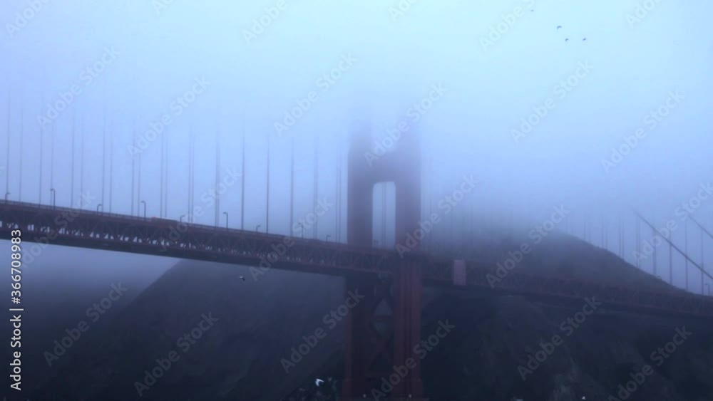 Moody shot of the Golden Gate Bridge from a Yacht. Foggy rainy day ... Moody shot of the Golden Gate Bridge from a Yacht. Foggy rainy day ...