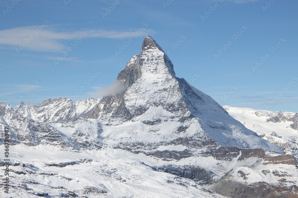 Beautiful and pure famous Matterhorn covers of white snow, looking from ...