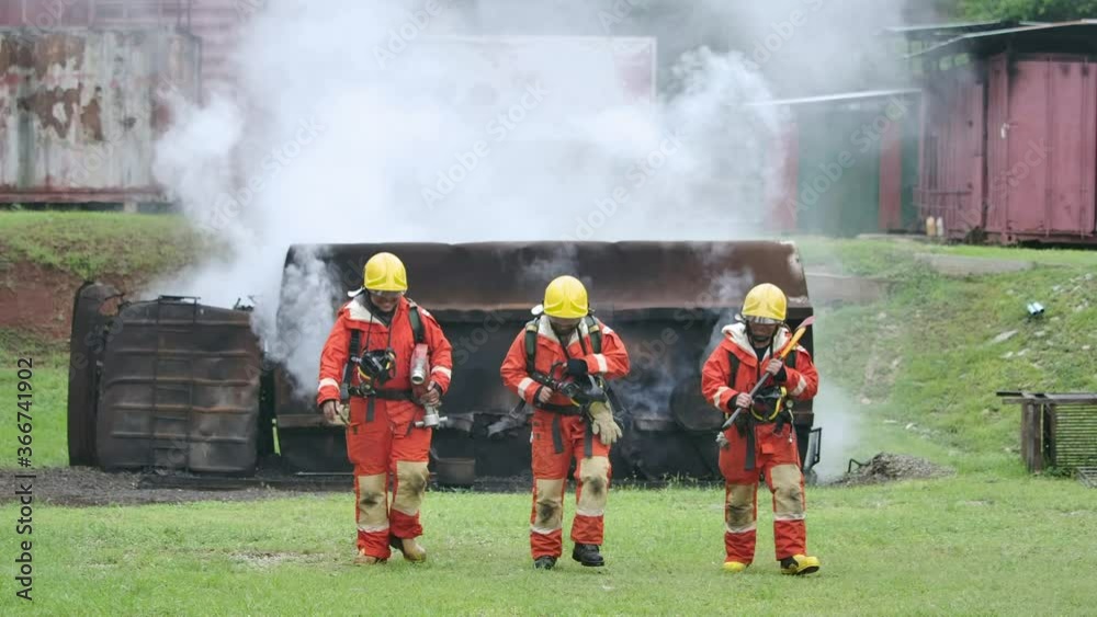 Fireman or firefighter teamwork from fire department wearing fire ...