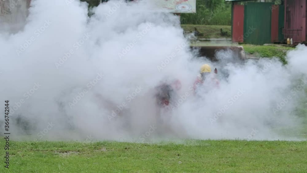 Fireman or firefighter teamwork from fire department wearing fire ...