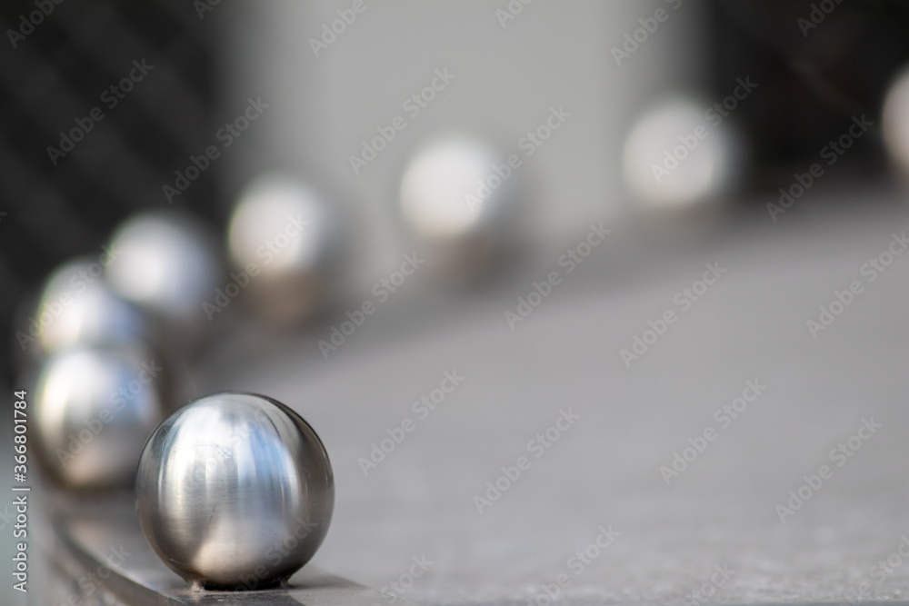 Matt steel balls in a row as decorative and ornamental balustrade and ...