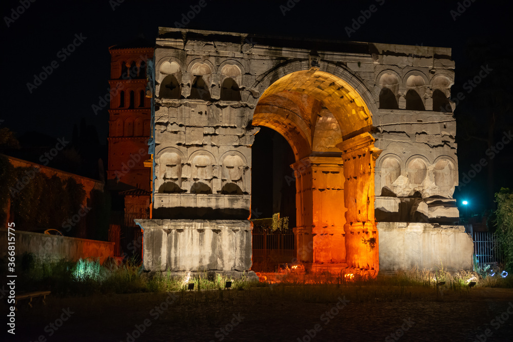 Night photo of the triumphal arch of Janus not far from the Temple of ...