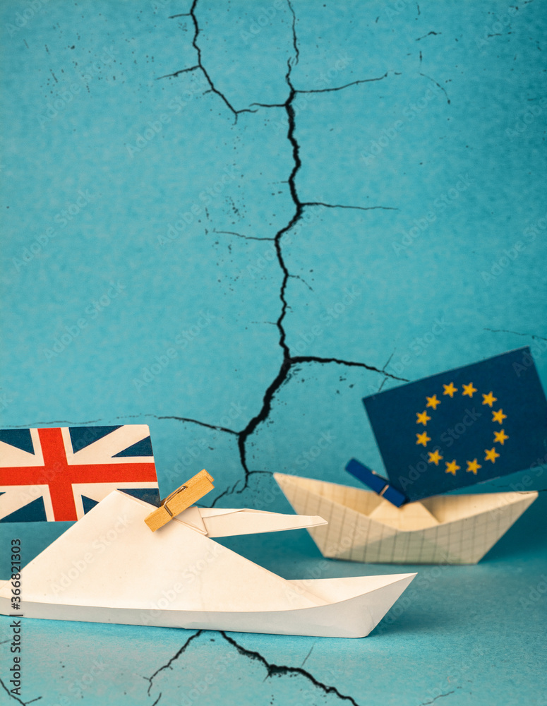 paper ships from the flags of the European Union and the UK ...