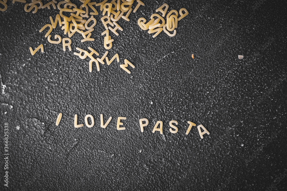 I love pasta sign formed of Italian letter shaped pasta product on the ...