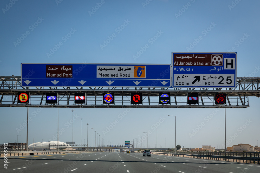 streets of Doha, Qatar, with traffic signs and finished infrastructure ...