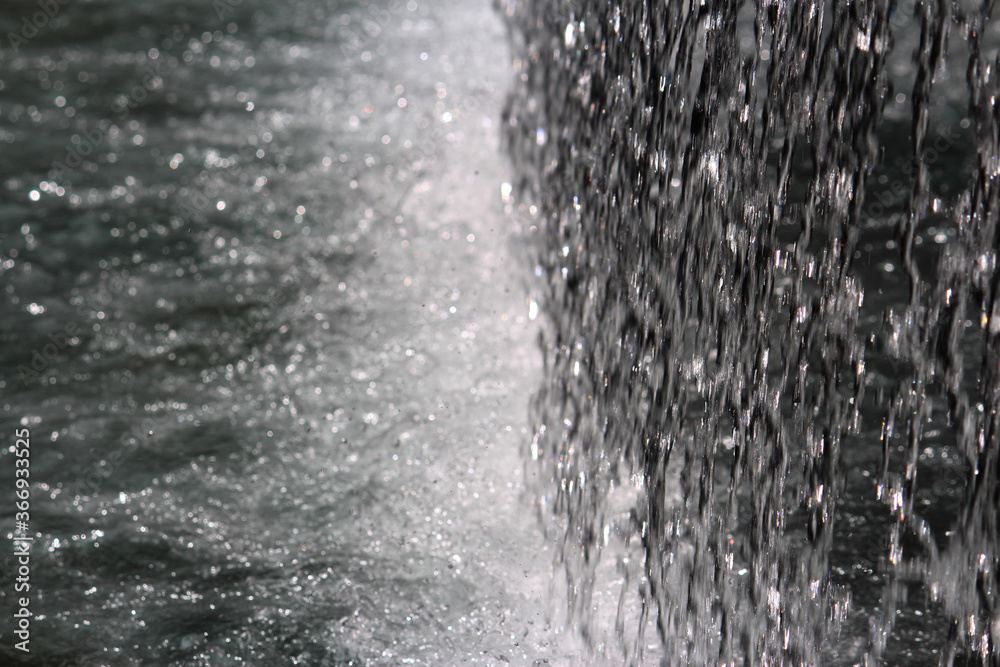 Water coming down from a water feature / fountain and aggressively ...