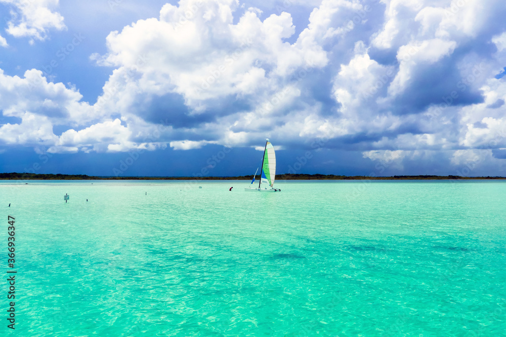 Small sailing catamaran in Bacalar Lagoon, Quintana Roo / Mexico Stock ...