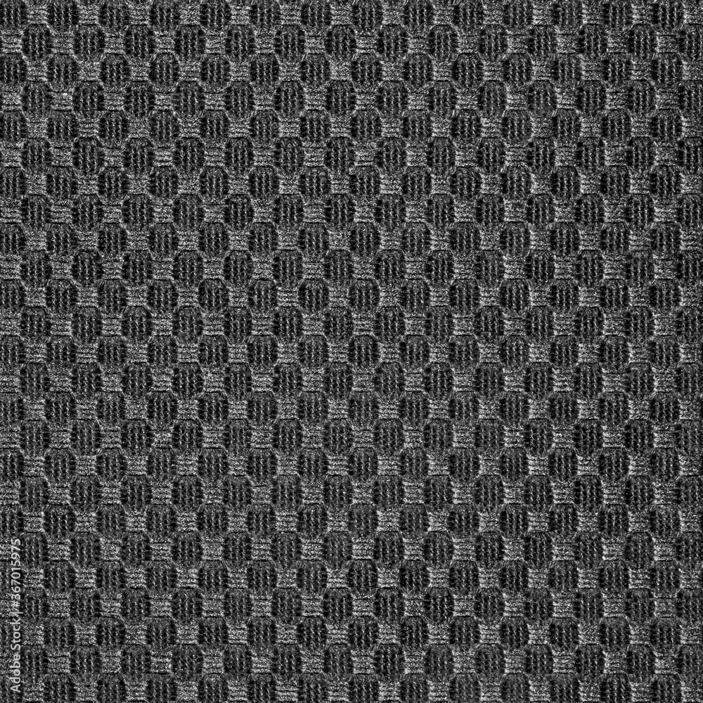 Texture of black fabric embroidered in a checkerboard pattern ...