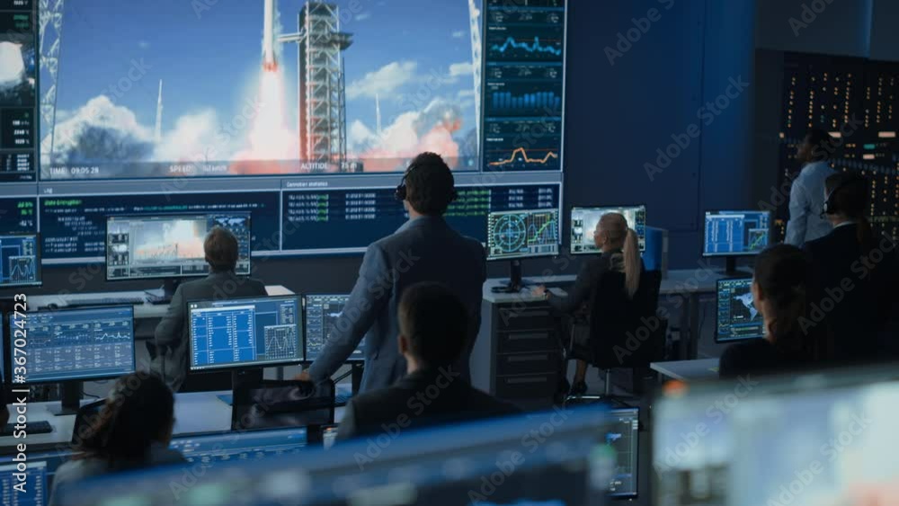 Stockvideo Group of People in Mission Control Center Witness Successful ...