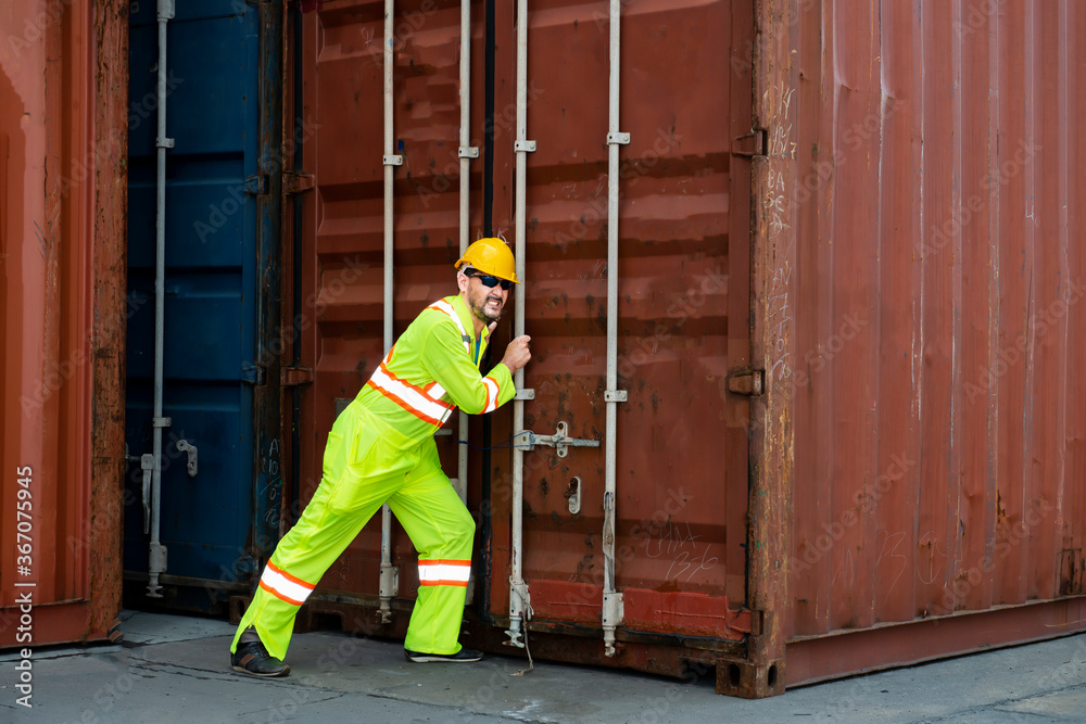 Smart engineer man wearing industrial work wear coverall with ...