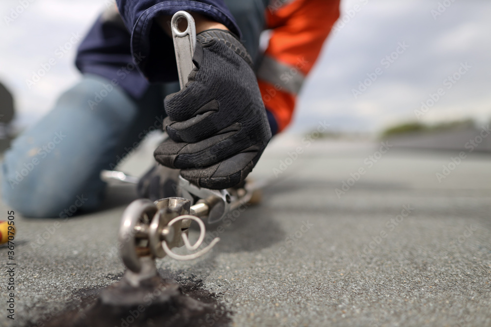 Safety workplace trained safety auditor wearing black safety glove ...
