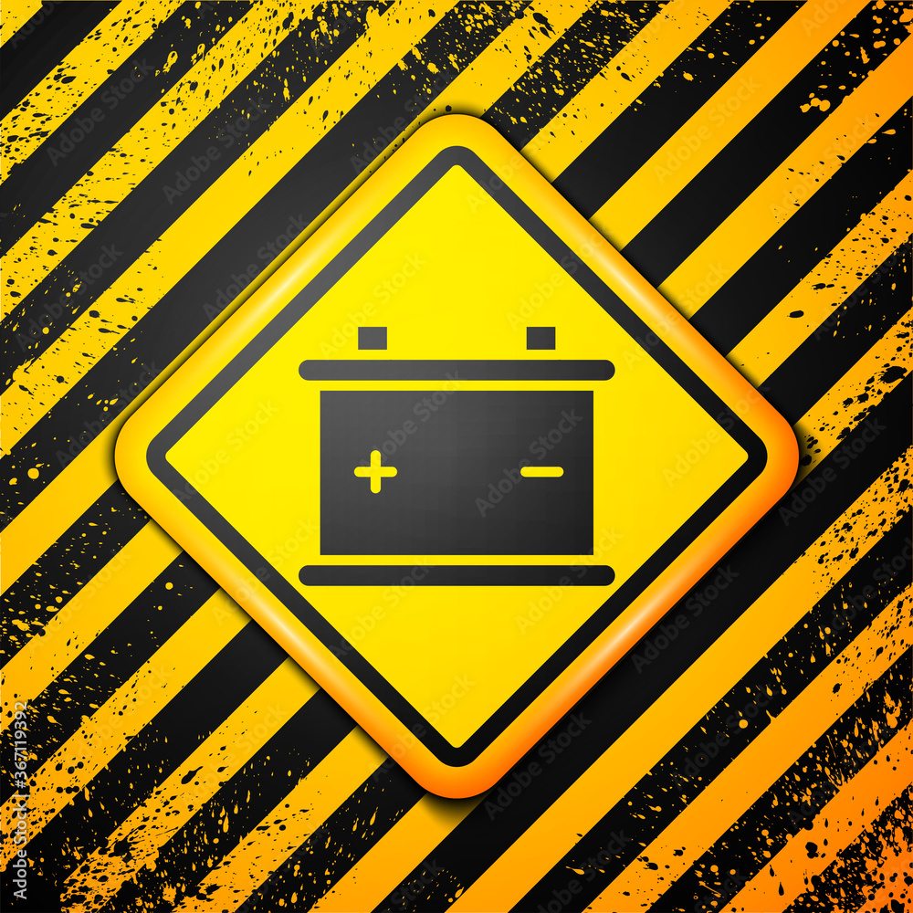 Black Car battery icon isolated on yellow background. Accumulator ...