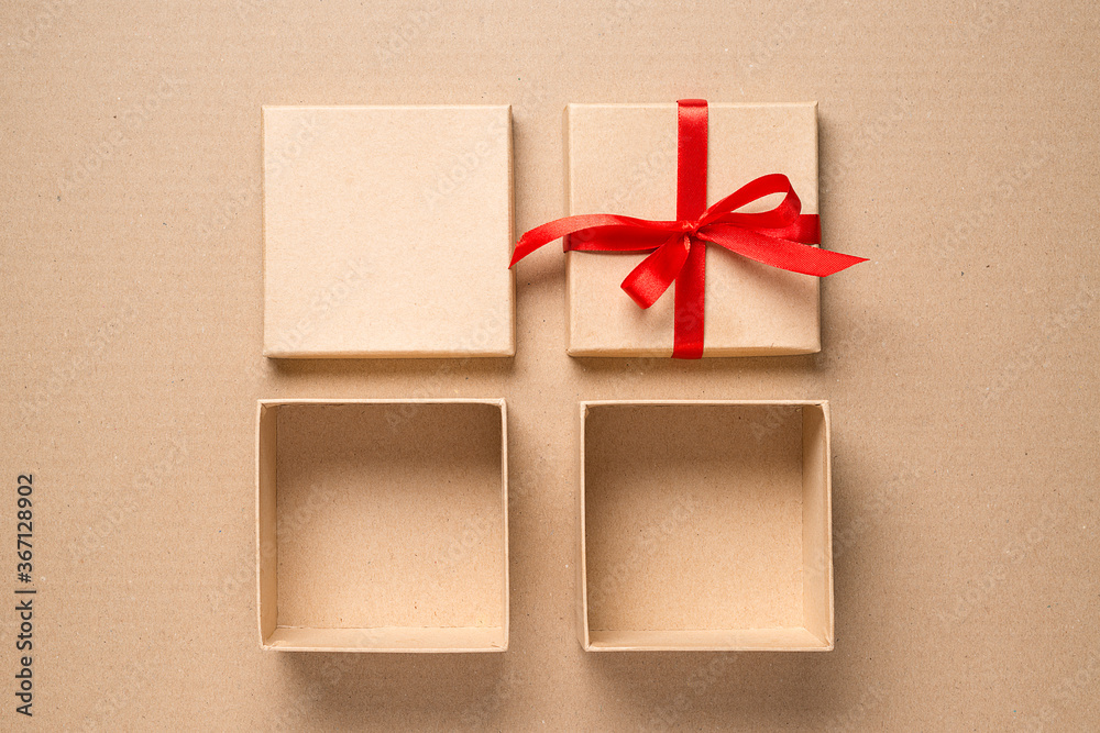 Empty open gift cardboard boxes on a cardboard background. top view ...