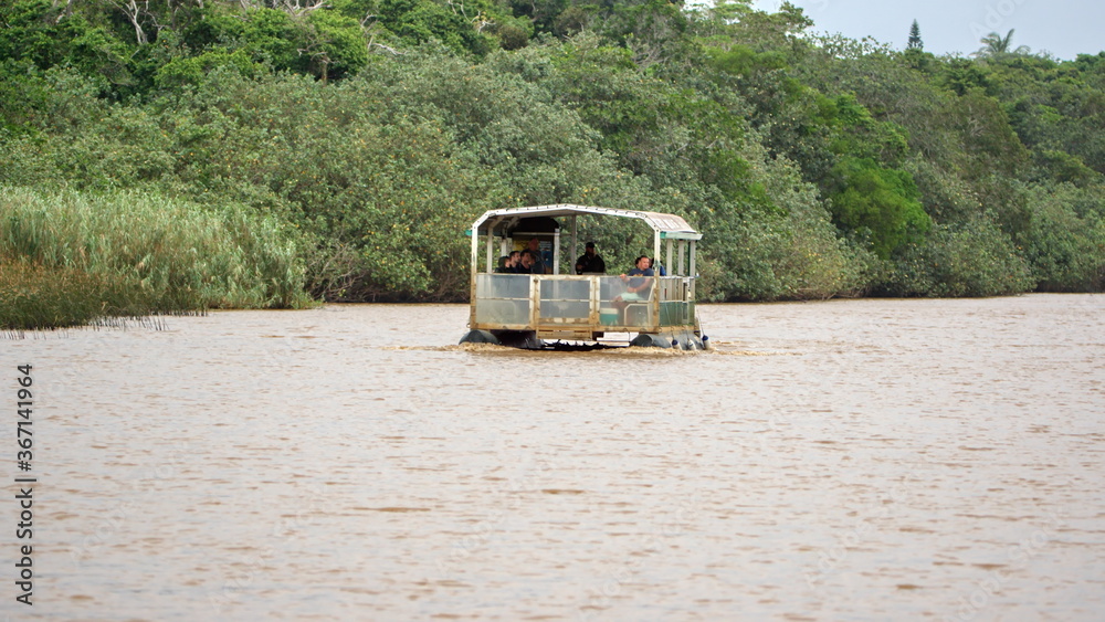 Pontoon boat for estuary tours in the iSimangaliso Wetland Park in St ...
