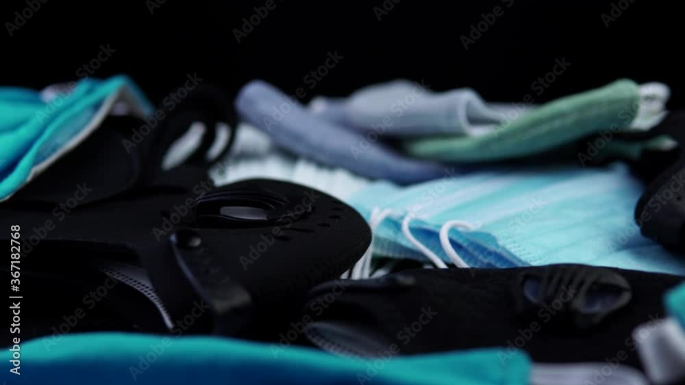 Background full of disposable and washable masks for disinfection and ...